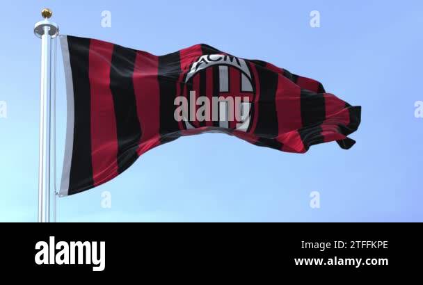 Milan, Italy, July 2022: The flag of A.C. Milan waving in the wind on a ...