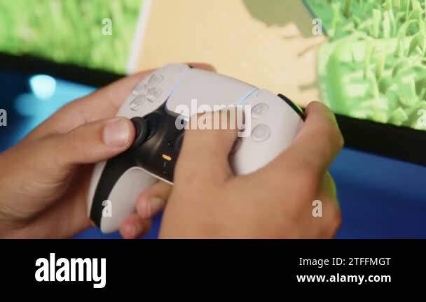 Boy Laying down his PS5 controller after gaming on his PlayStation 5 in ...