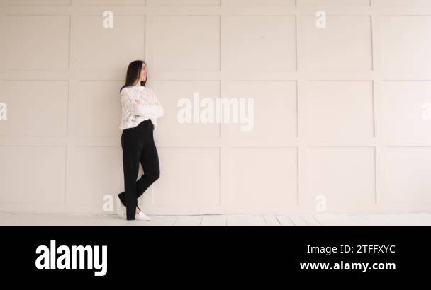Young woman leaning wall Stock Videos & Footage - HD and 4K Video Clips ...