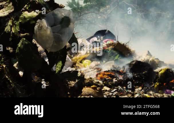 Close up shot of environmental Pollution of Earth showing burning ...