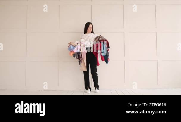 Woman throwing clothes Stock Videos & Footage - HD and 4K Video Clips ...