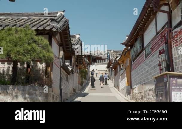 People walking around in Bukchon Hanok Village in spring Seoul, Korea ...