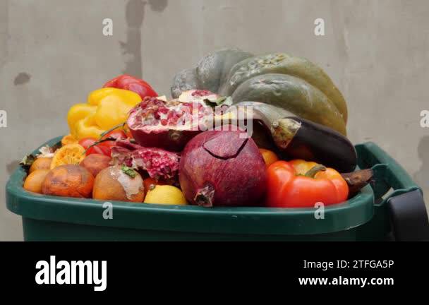 Food Waste in Grocery Store Retail. Discarded unsold damaged fruits and ...