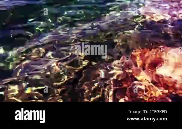 A surreal abstract shifting background reminiscent of rippling water ...