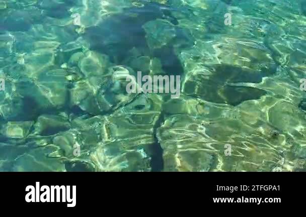 Green azure turquoise blue transparent sea salt water texture. Slow ...