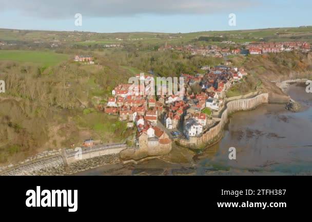 North York Moors Heritage Coast, Robin Hoods Bay, Aerial drone flight ...
