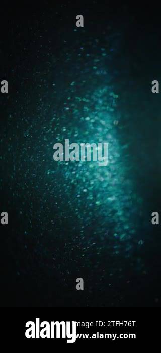 Blur glitter texture. Particles background. Bokeh light flare. Defocused blue green purple color ...