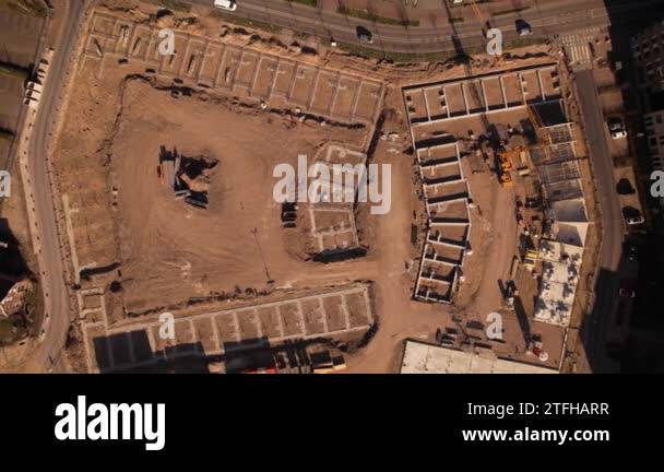 Sideways aerial pan showing PUUR21 urban development housing project ...