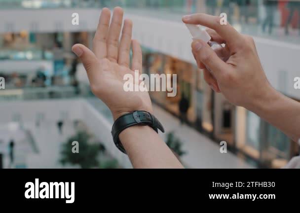 Close up male arms cleaning by sanitizer hands remedy prevention ...