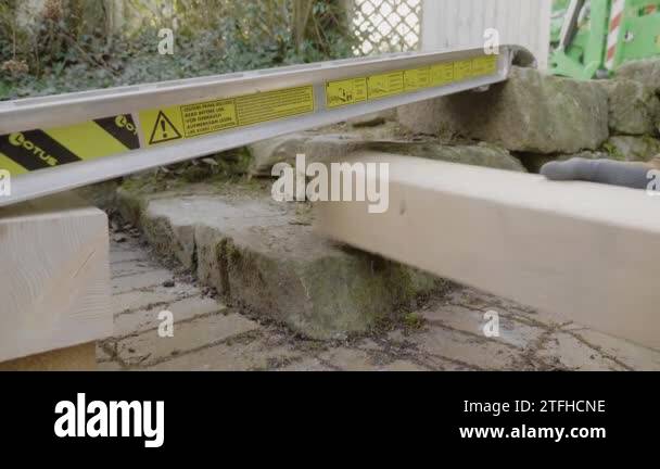 A Positioning of wooden beams under a ramp Stock Video Footage - Alamy