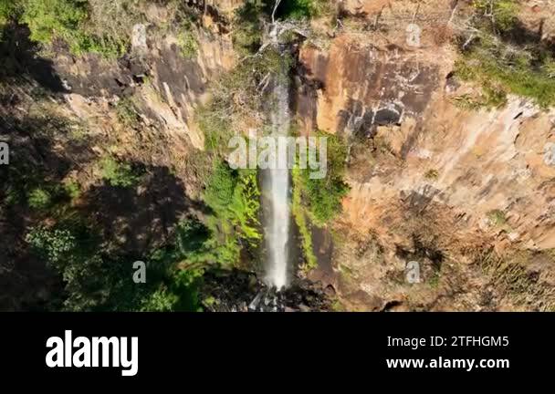 Waterfall at scenic gorge canyon. Peaking waterfall landscape. Nature ...