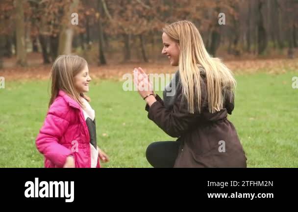 Mother and daughter playing clapping game Stock Video Footage - Alamy Mother and daughter playing clapping game Stock Video Footage - Alamy