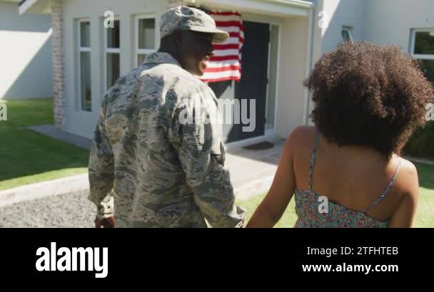 Video of african american soldier and his wife back home together ...