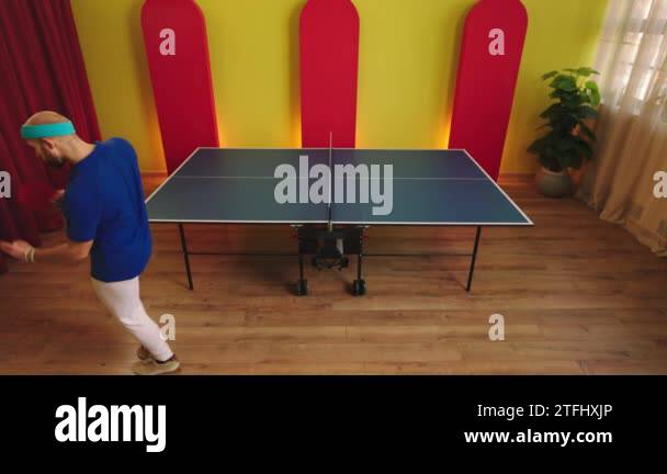 Excited good looking young guy dancing in front of the camera after he ...