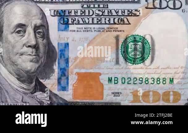 Serial Numbers of 100 Dollars Bills Changing, Stop Motion, Close-Up ...
