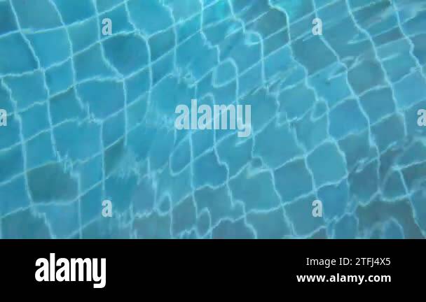 Background of swimming poll surface blue water with ripple, Clen water ...