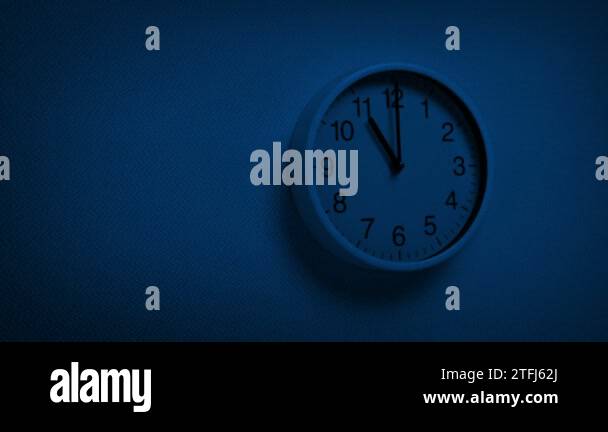 11 O'Clock Wall Clock At Night Stock Video Footage - Alamy