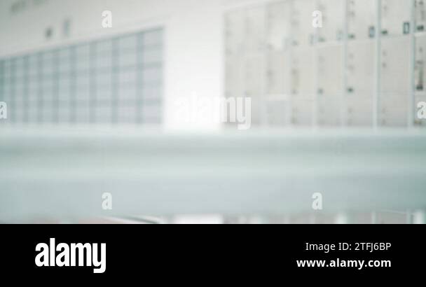 Defocused view of p.o. boxes in a row. Out of focus background inside ...