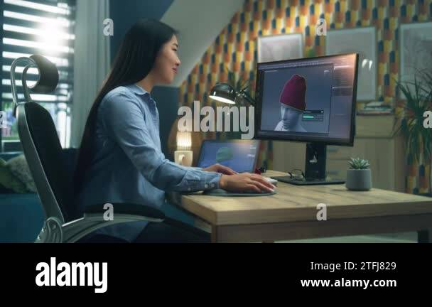 Female asian 3D designer having remote work on 3D modeling and creating ... Female asian 3D designer having remote work on 3D modeling and creating ...