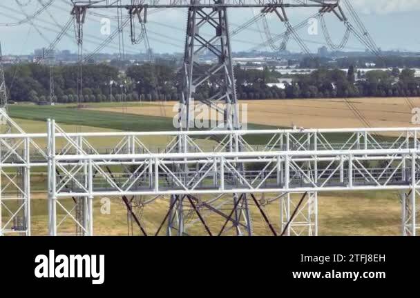 Pylons at a High Voltage Three Phase Electrical Substation Stock Video ...