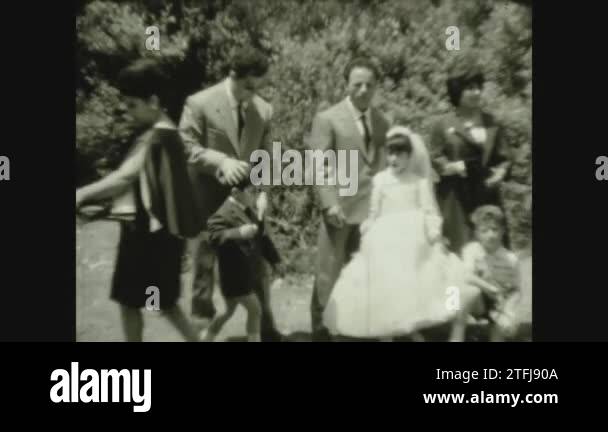PALERMO, ITALY MAY 1966: Little girl with family first communion ...