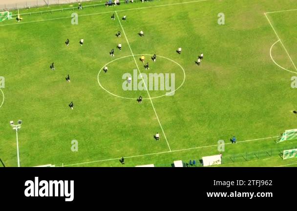 Aerial top down view of soccer field two professional teams playing ...
