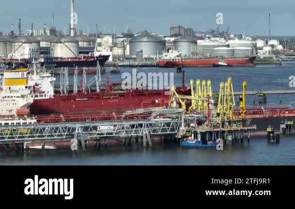 Liquid Cargo Transporter Ships Unloading Crude Oil to a Fuel Depot ...