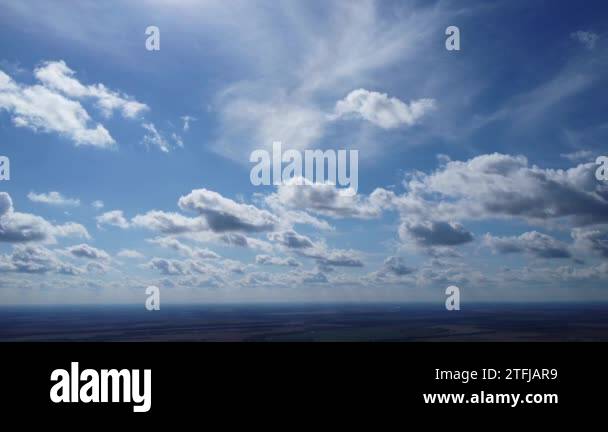Clouds in blue sky. High altitude video. Earth nature background ...