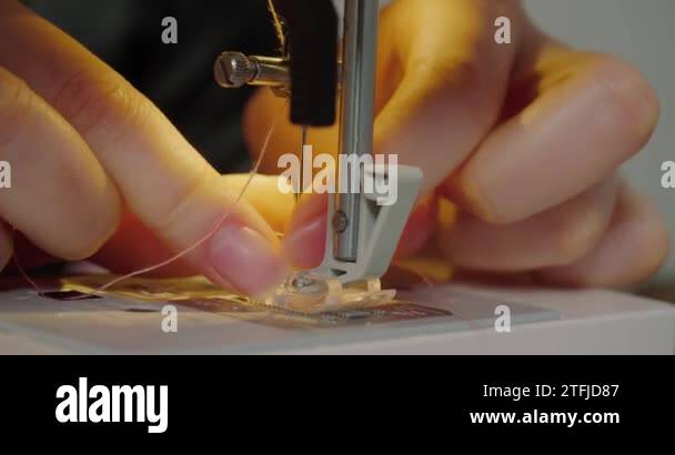 Tiny sewing machine Stock Videos & Footage - HD and 4K Video Clips - Alamy