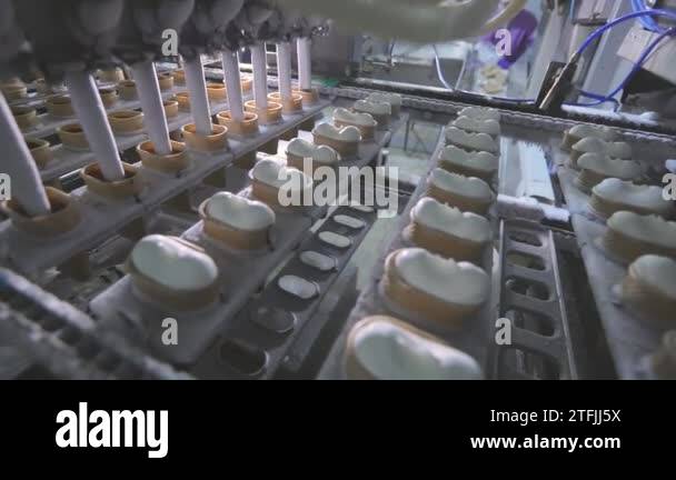 The process of making ice cream. Production of ice cream on an ...