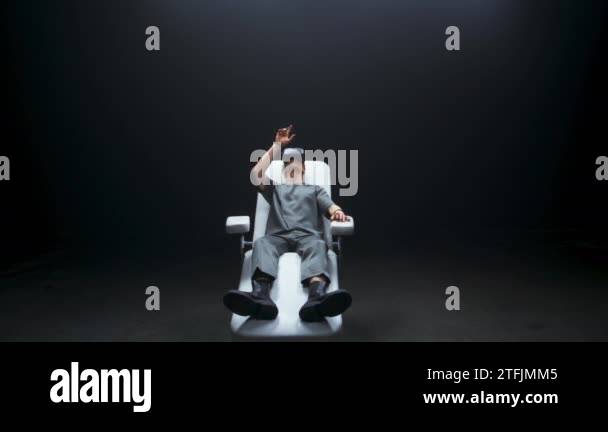Nano technologies man immersed VR dark room. Future device person ...