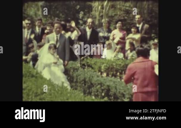PALERMO, ITALY MAY 1966: Little girl with family first communion ...