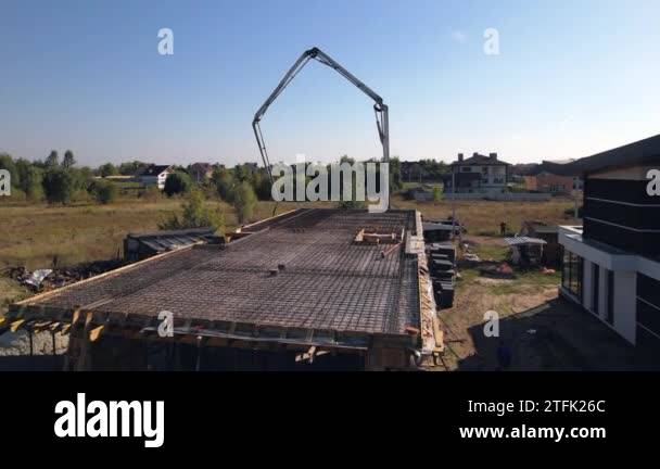 Construction of a house, on the site, pouring the ceiling with a ...
