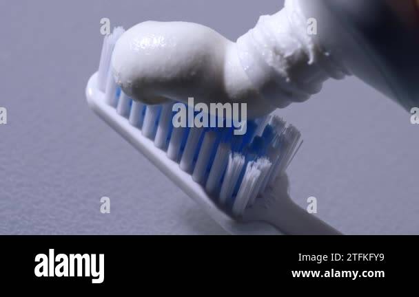 Squeezing toothpaste onto toothbrush Stock Videos & Footage - HD and 4K ...