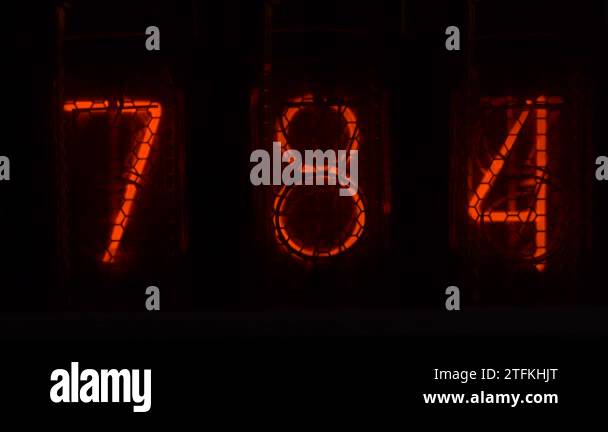 Retro vacuum tube display on the device counts seconds. Displaying ...