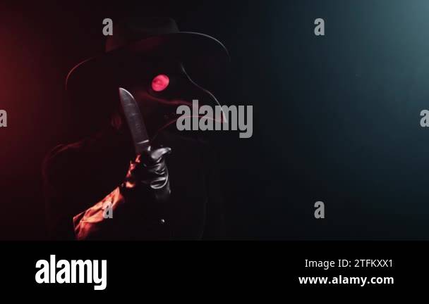 Plague doctor with sharp knife on black smoke background. Creepy raven ...