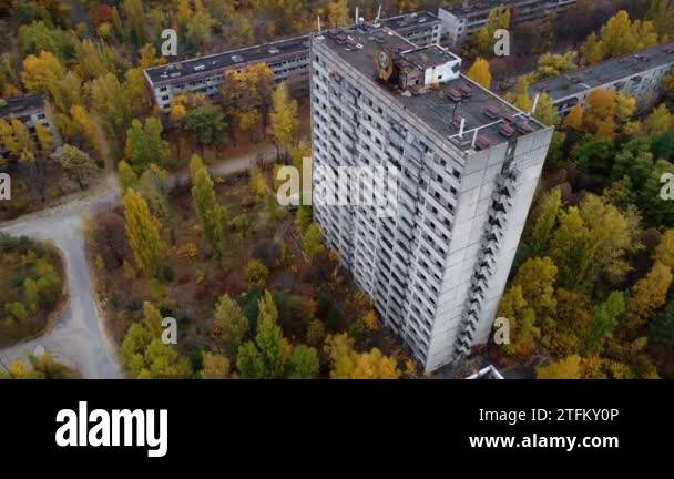 A drone view of an abandoned high-rise Soviet building in the Chernobyl ...