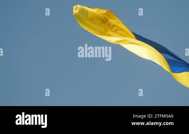Highly detailed fabric texture flag of Ukraine. Slow motion of Ukraine ...