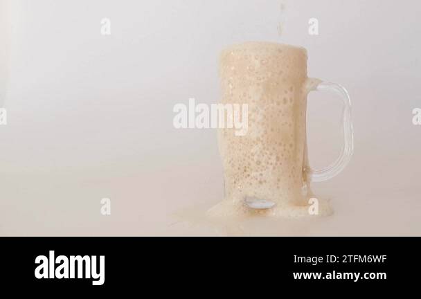 Beer foam overflowing from glass Stock Videos & Footage - HD and 4K ...