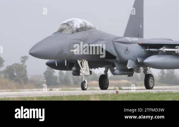 Military pilots under the canopy in the cockpit of a military aeroplane ...