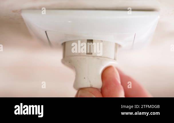 Inserting the plug into the socket close-up, top view. The euro socket ...