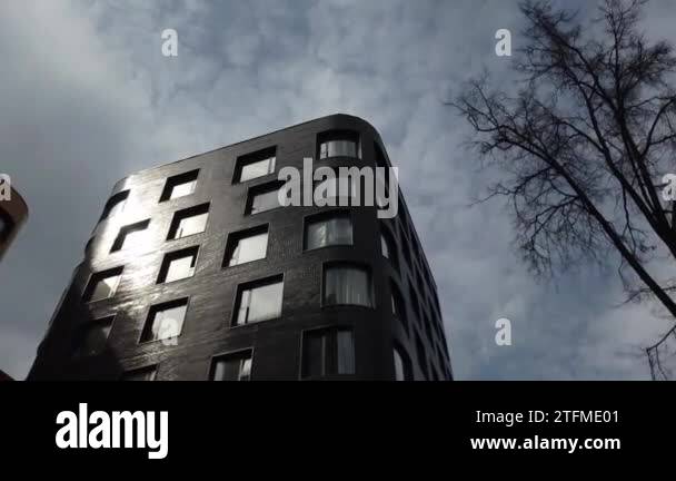 Exterior of a high-rise apartment building facade, windows and ...