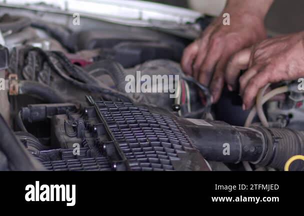 Car mechanic changing fuel filter Stock Videos & Footage - HD and 4K ...