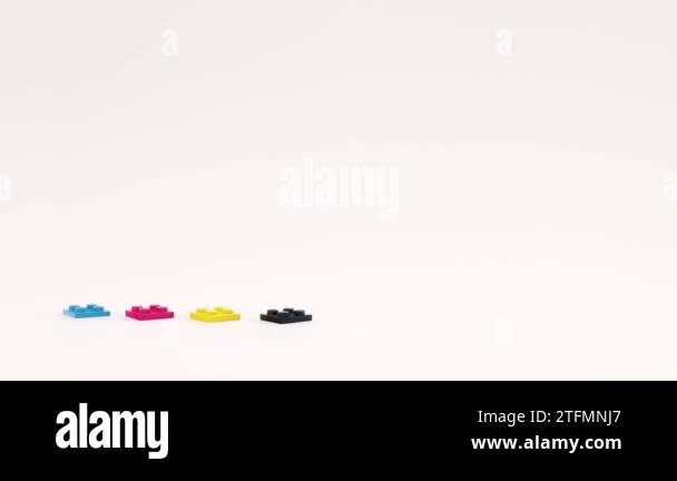 4 Columns of CMYK color toy blocks. Stop motion animation Stock Video ...