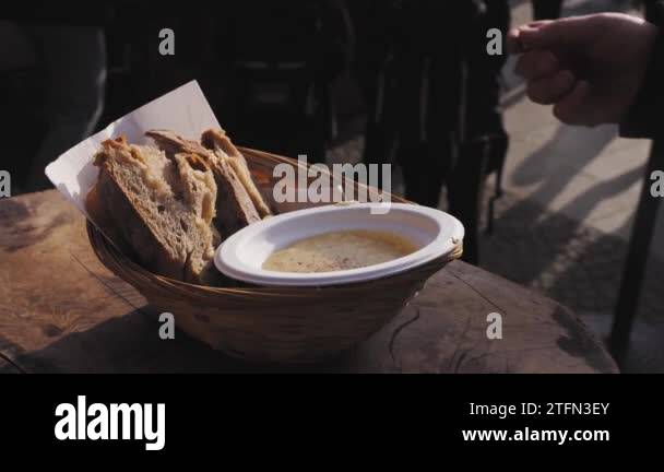 Close up of Swiss cheese fondue with bread on a Christmas market in ...