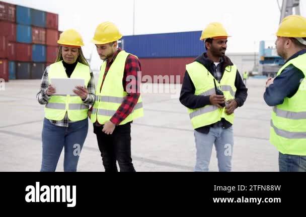 multiracial port freight logistics workers, Container loading ...