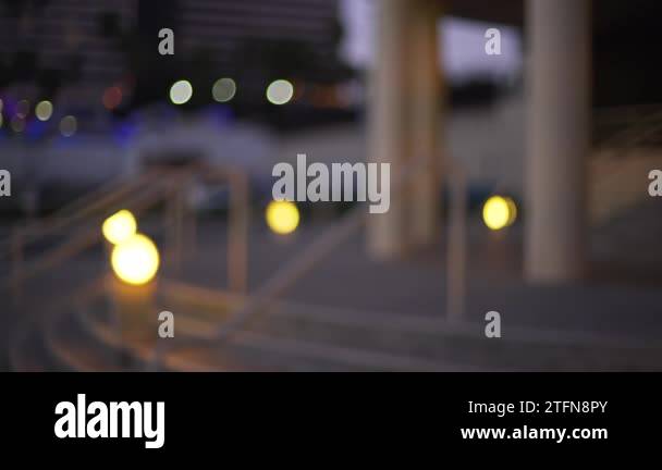 Out of focus background plate of front steps of building in downtown ...