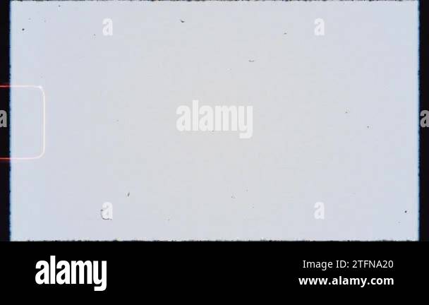 A vintage Super 8mm film frame overlay with a sprocket hole, dirt, hair ...