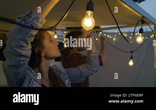 Young couple making lights decorations Stock Videos & Footage - HD and ...