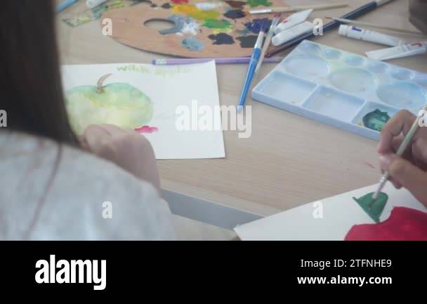 Closeup group of student sitting and studying and learning drawing with ...
